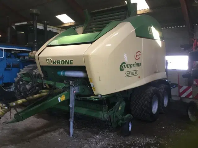 KRONE Comprima CF155 XC Extreme Med næsten nye bånd | Kongerslev ...
